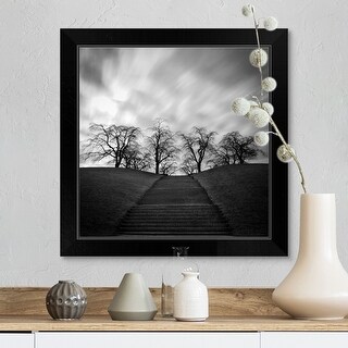 "Long exposure bw image with moving clouds, stairs and grass covered ...