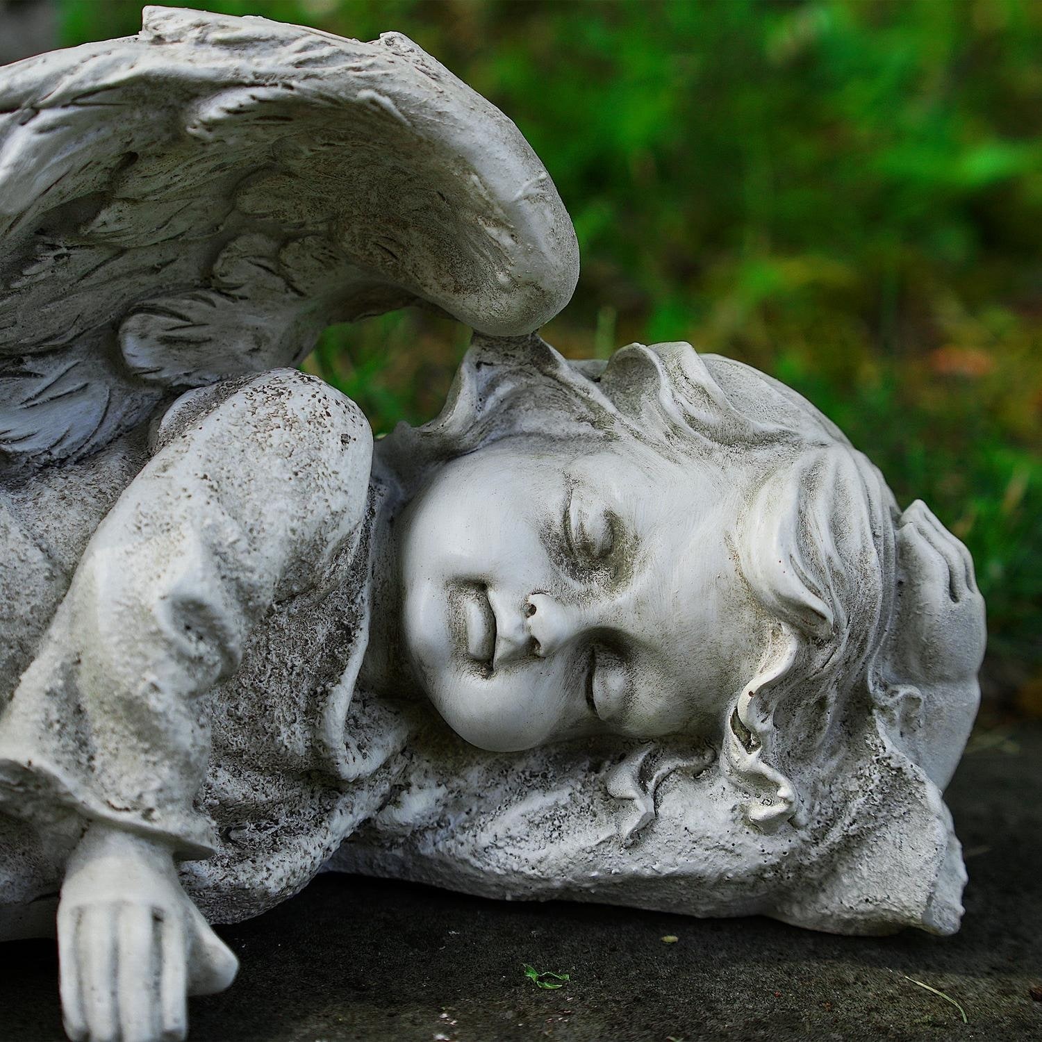 sleeping cherub statue