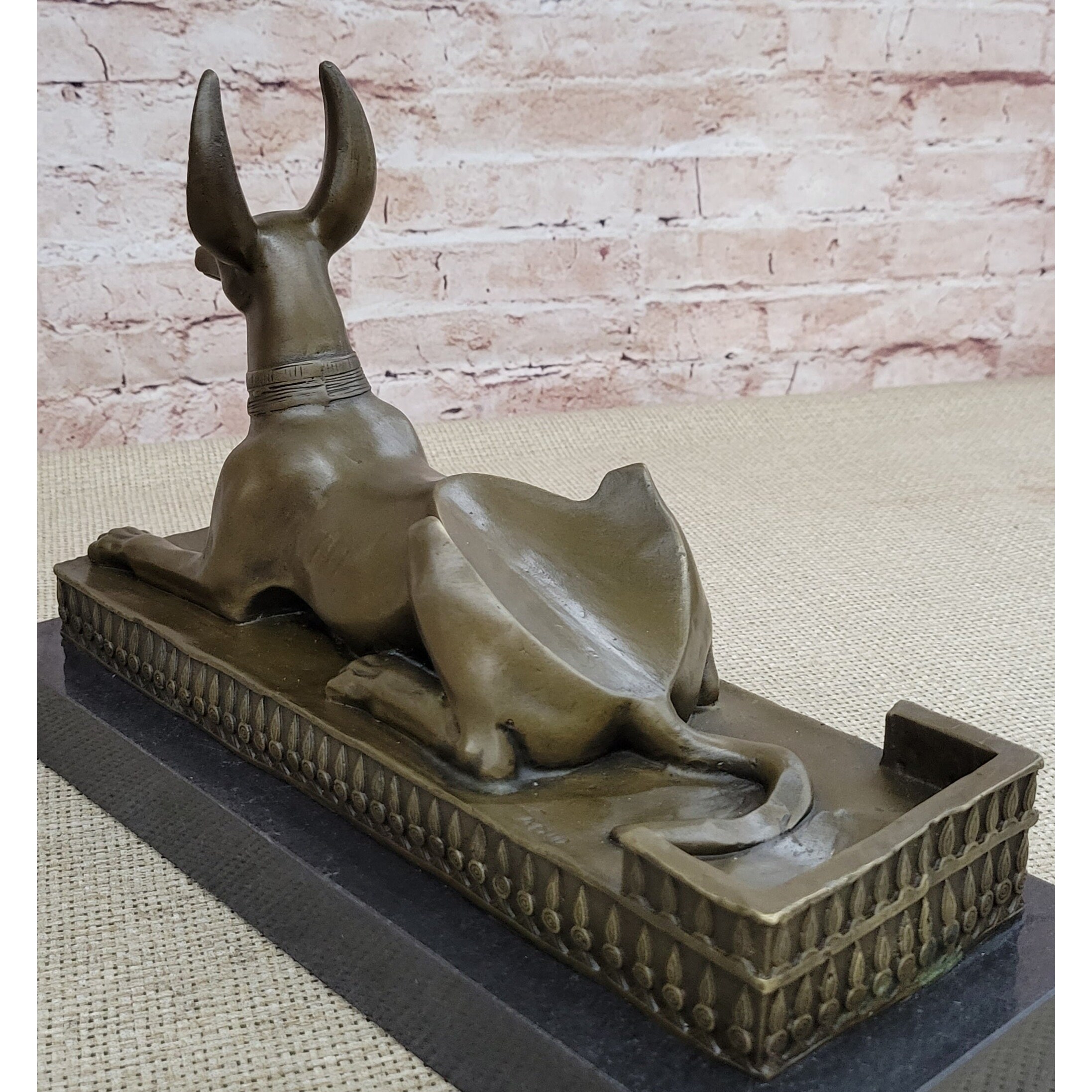 anubis stone statue