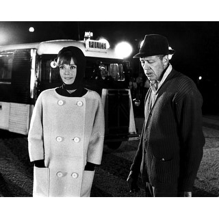 Audrey Hepburn and Richard Quine standing in front of a bus Photo Print ...