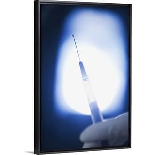 "Studio shot of hand holding syringe" Black Float Frame Canvas Art ...
