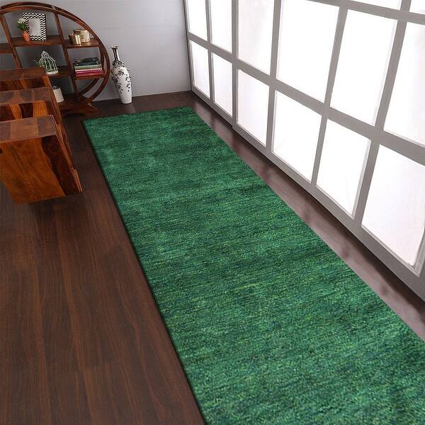 solid dark green rug