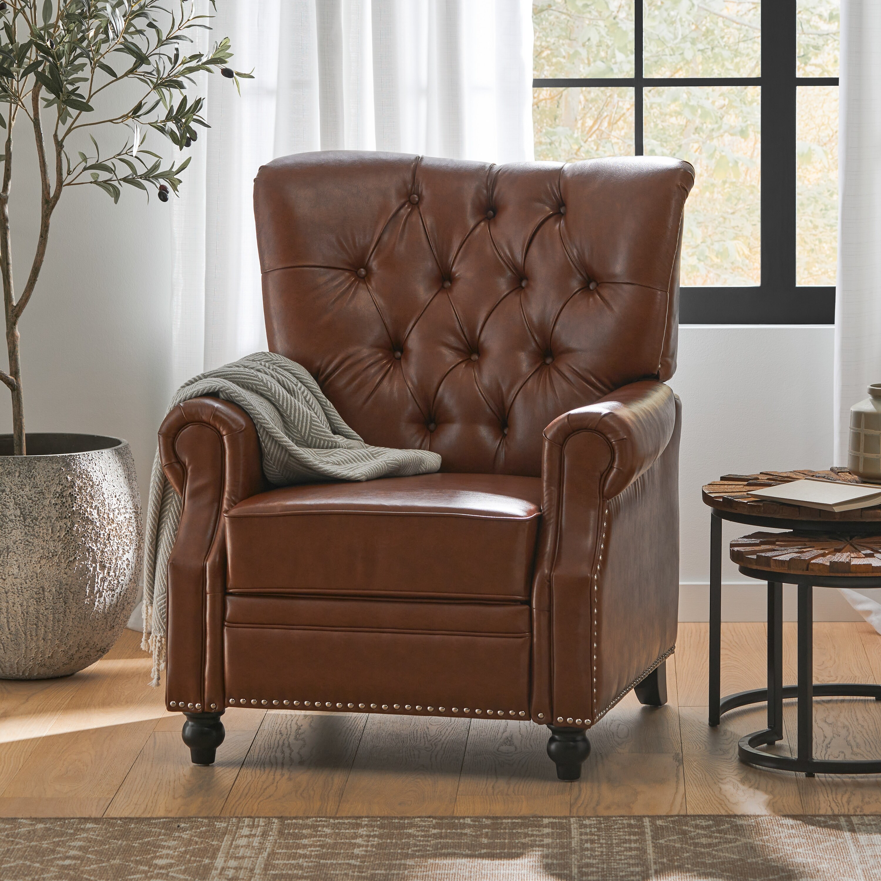 Button tufted leather recliner store