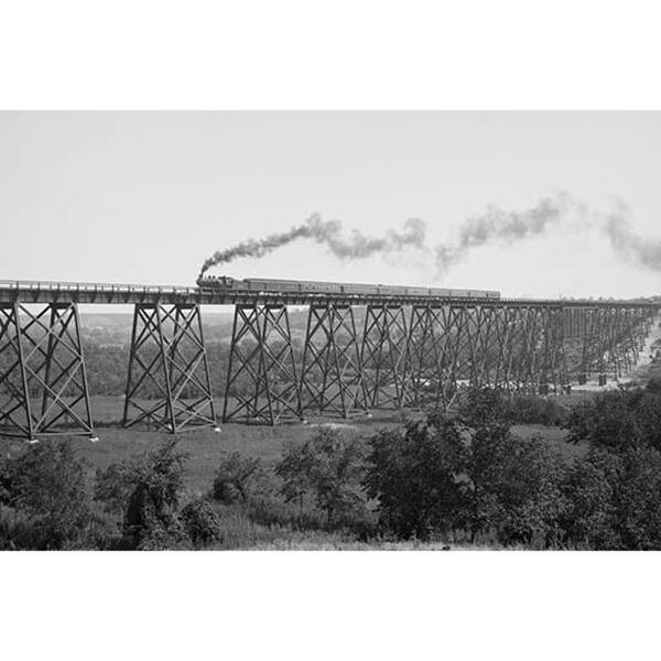 Steam Locomotive And Train Passes Over Valley Trestle Bridge Chicago ...