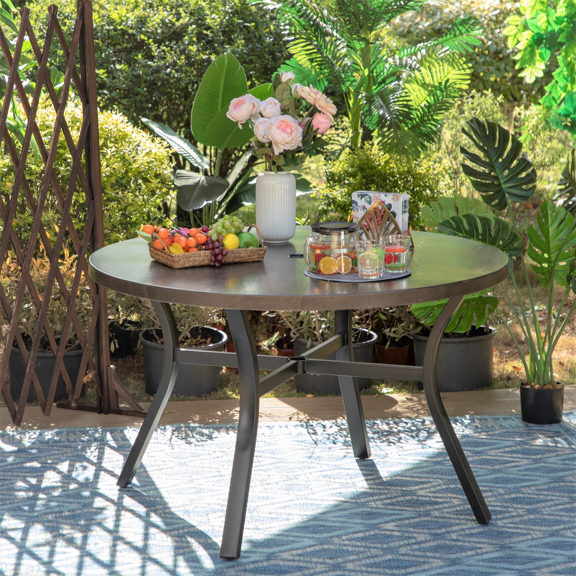 Round outdoor dining table with swivel chairs store