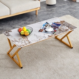 A modern minimalist style marble patterned coffee table with golden ...