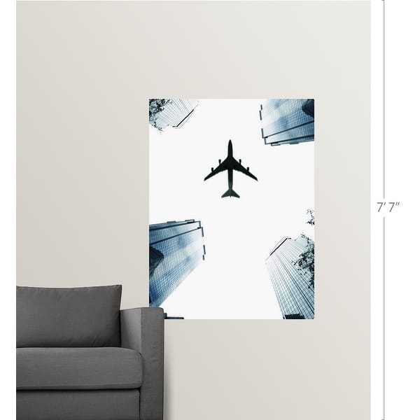 "Airplane flying above skyscrapers" Poster Print - Multi - Bed Bath ...