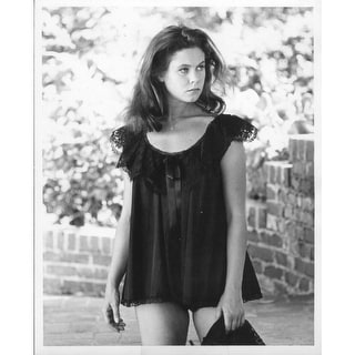 Elizabeth Montgomery Black Mini Dress With Brick Background Photo Print ...