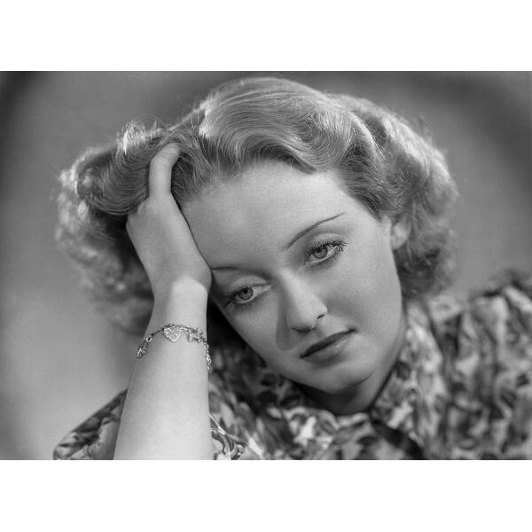 hand on forehead looking