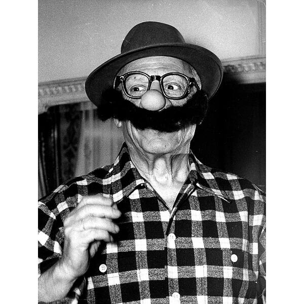 Pablo Picasso Holding Funny Mask Photo Print - Bed Bath & Beyond - 25396959