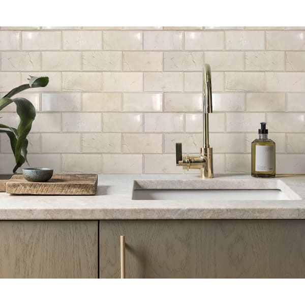 beige tile backsplash