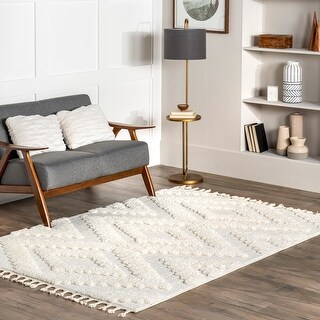 Brooklyn Rug Co Tinsley High/Low Geometric Tassel Area Rug - Bed Bath ...