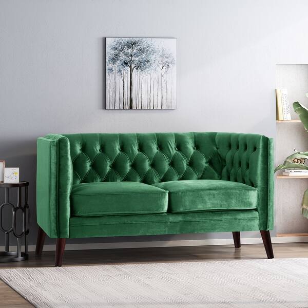 green button back sofa
