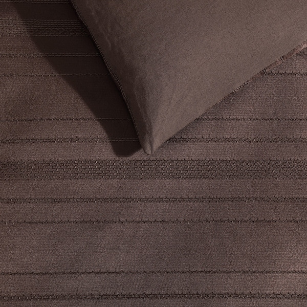 dark brown patterned sheets