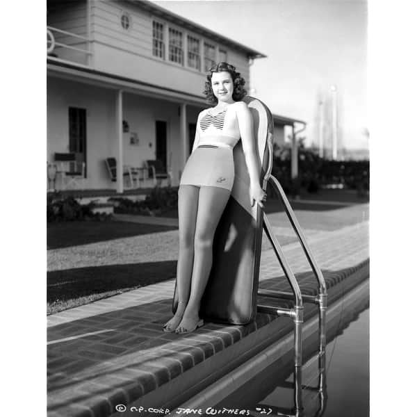 Jane Withers Posed in White Sleeveless Bodice and Mini Skirt with Legs ...