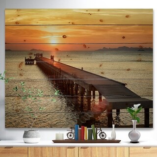 Designart 'Boat Pier At Sunset' Nautical & Coastal Wood Wall Art ...