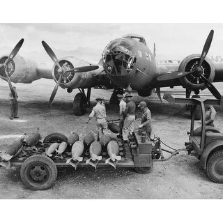 An Ordnance Crew Loading 300 Pound Bombs Into A US Air Force Bomber ...