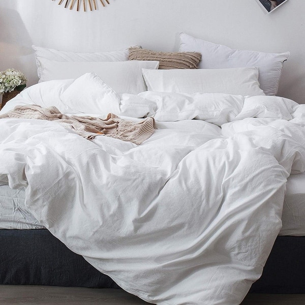 white textured bed sheets