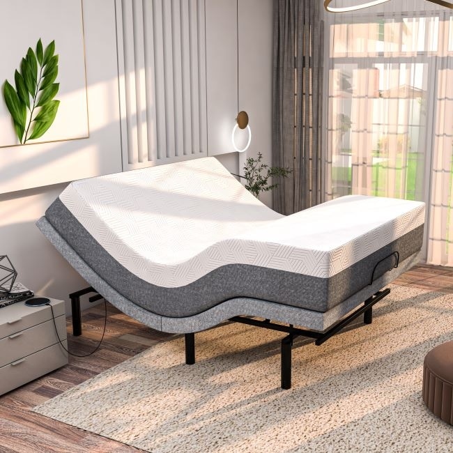 Queen size adjustable bed with dual controls store